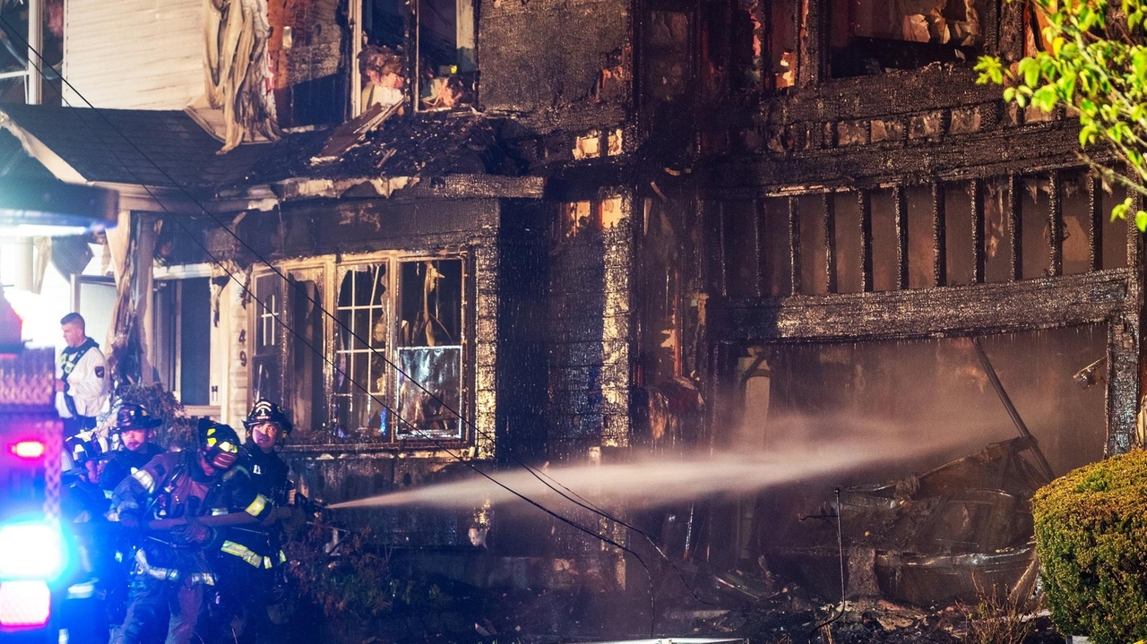 Five treated after fire damages two homes in North Babylon - Newsday
