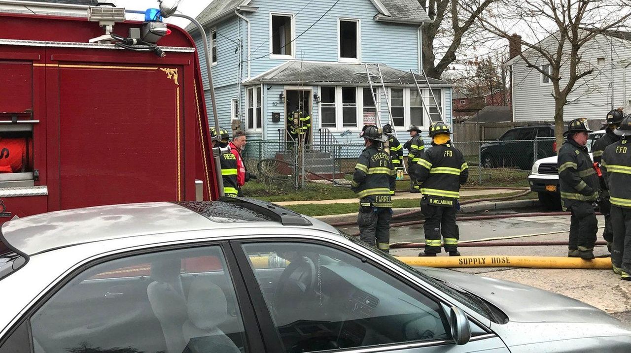Family of 4 escapes Freeport house fire uninjured, cops say - Newsday