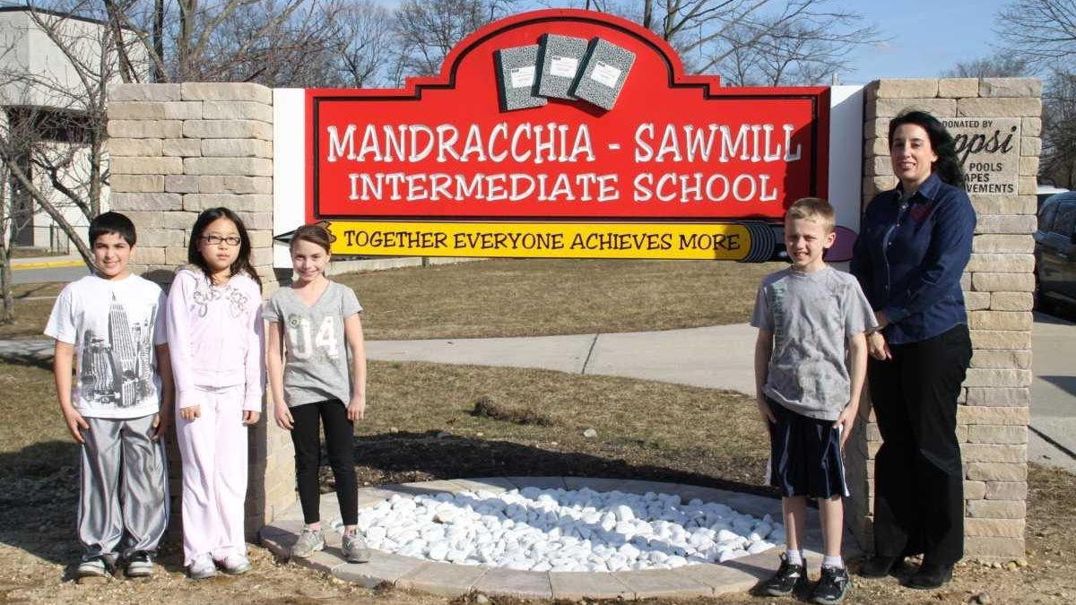 Smithtown company donates for school signs - Newsday