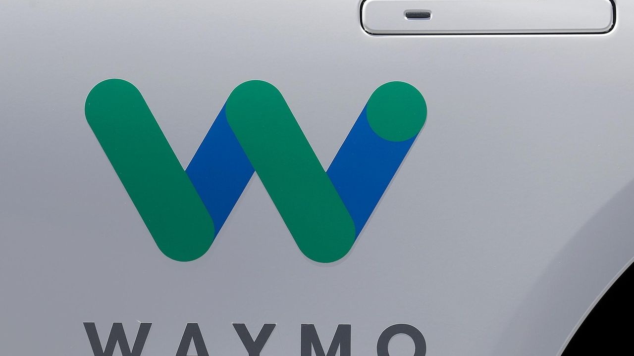 Waymo's robotaxi service expands into Los Angeles, starting free rides ...